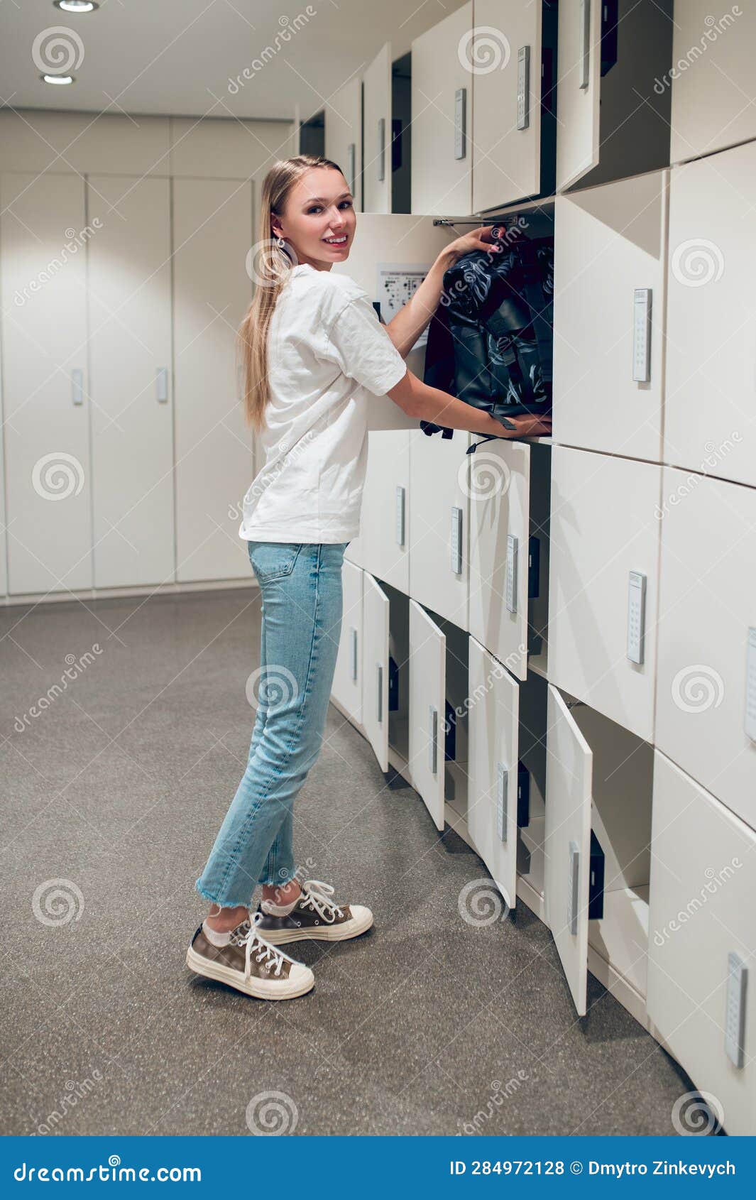 Blonde Young Girl Opening the Locker Stock Photo - Image of technology ...