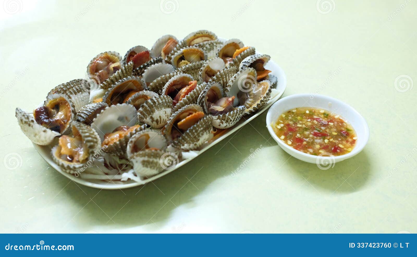 Blood Cockles on the Dish on Table with Spicy Sauce Stock Photo - Image ...