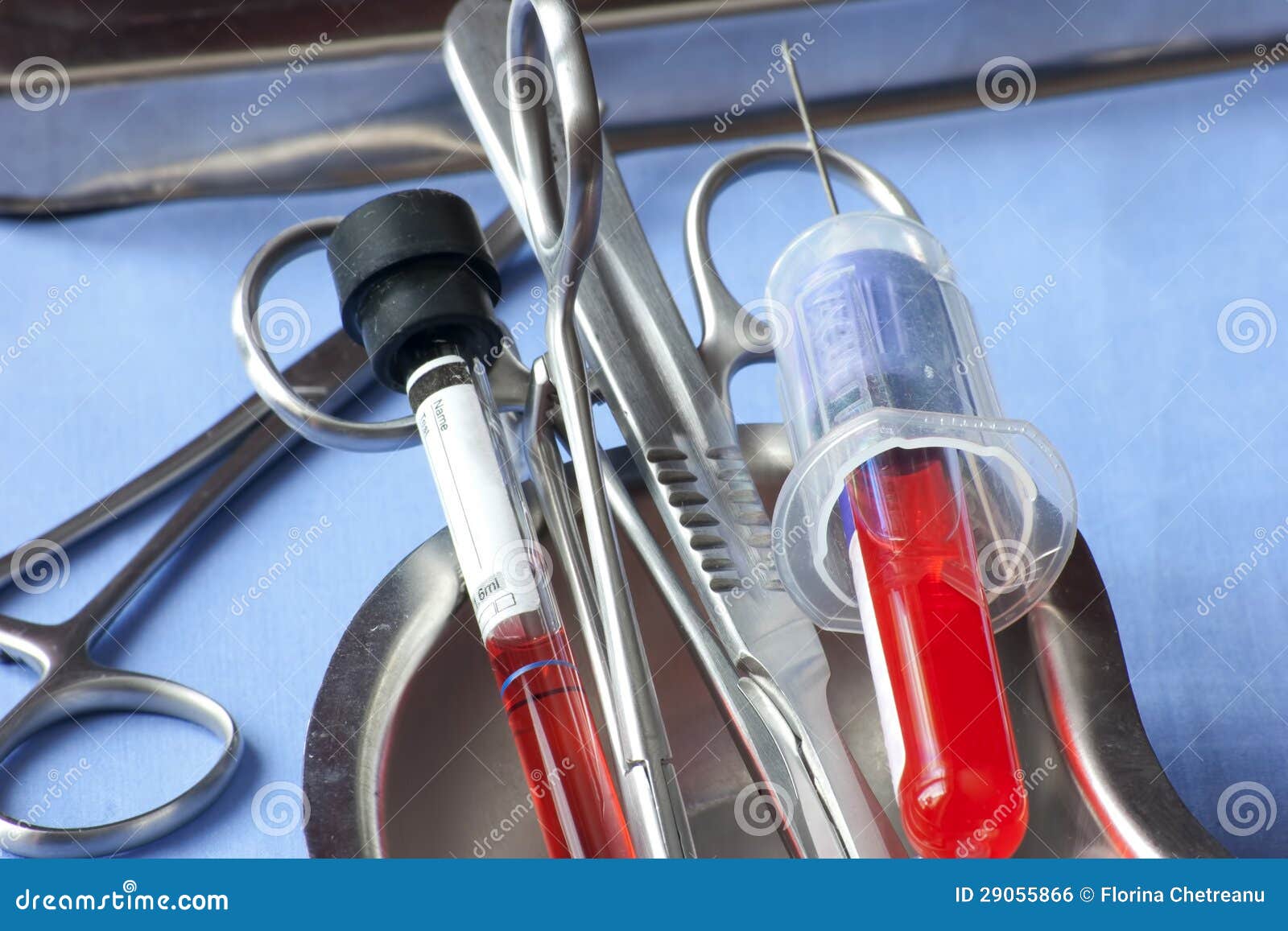 Blood Collection Containers and Surgical Instruments Stock Photo ...