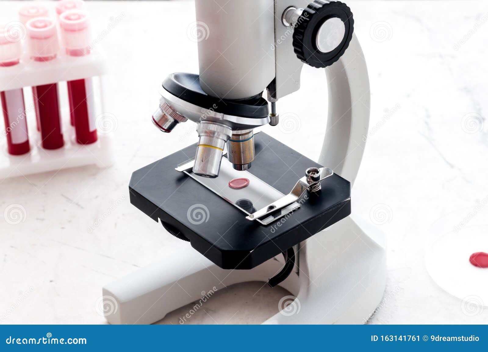 Blood Drop Under Microscope on White Background Stock Image - Image of ...