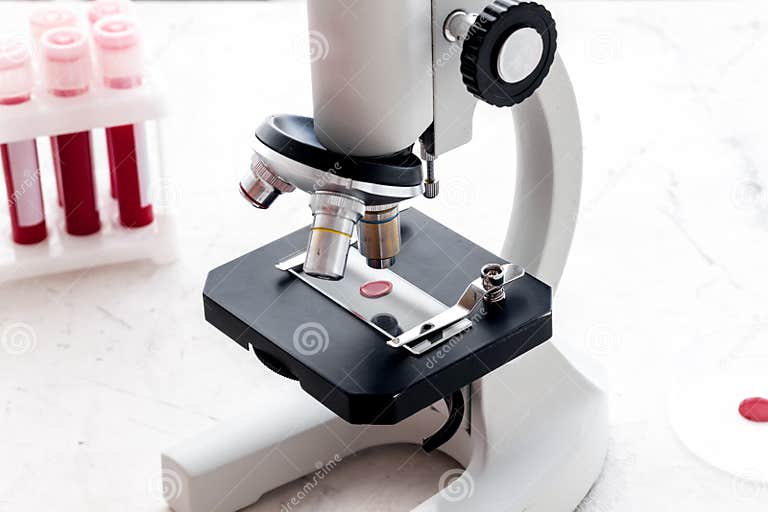Blood Drop Under Microscope on White Background Stock Image - Image of ...