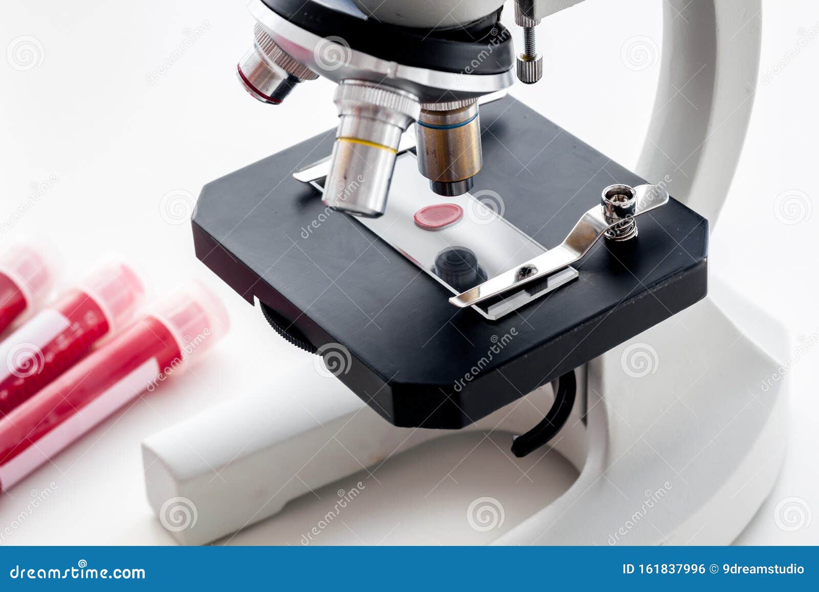 Blood Drop Under Microscope on White Background Closeup Stock Photo ...