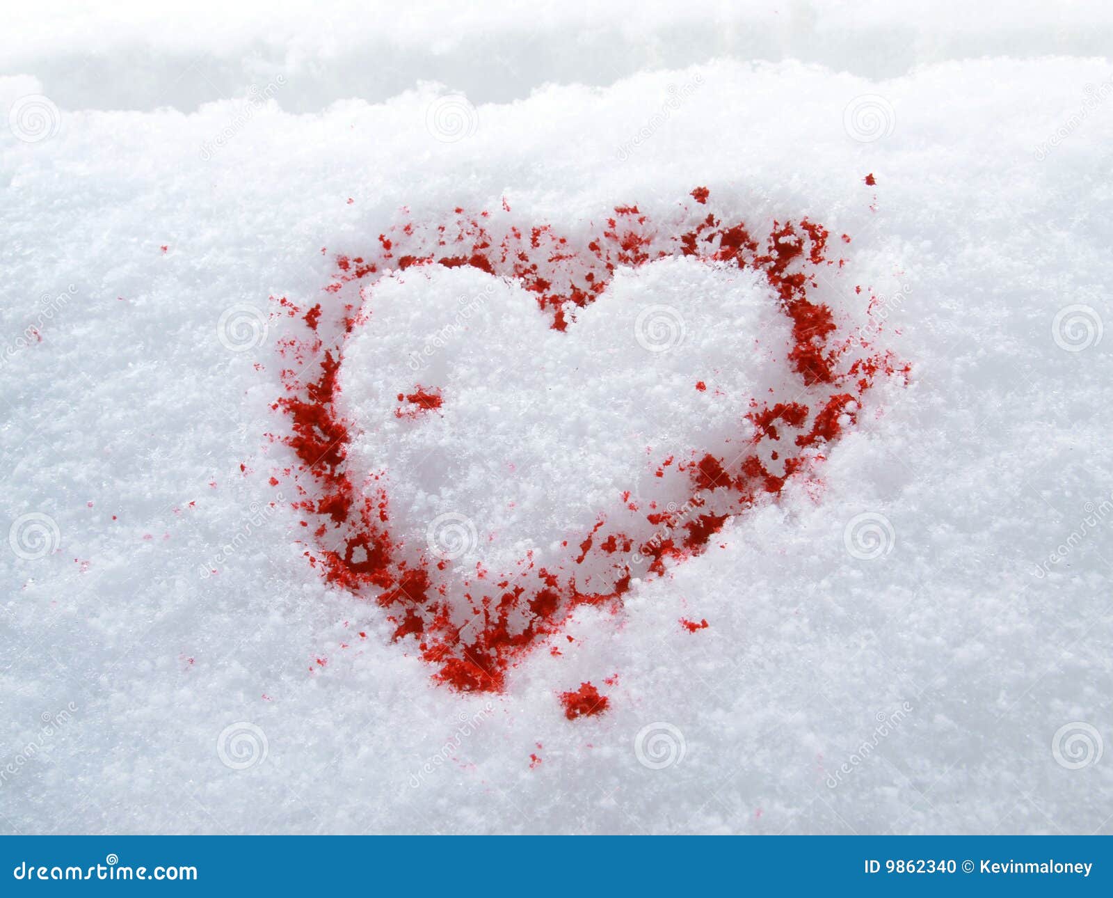 Blood heart-shape in snow stock photo. Image of season - 9862340