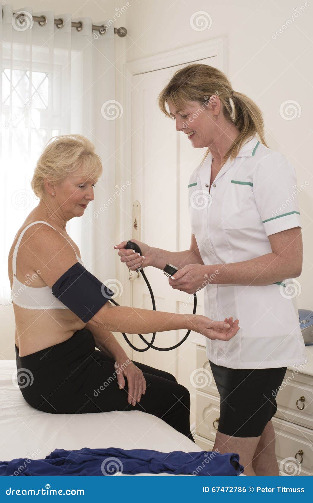 Blood Pressure Check on Patient Stock Photo - Image of practise, clinic ...