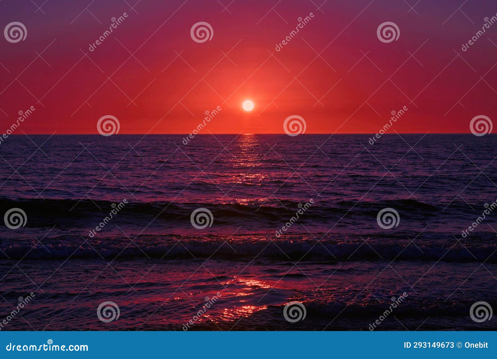 The Blood Red Sun Sets on the Blue Ocean. Dramatic Sunset on the Sea ...