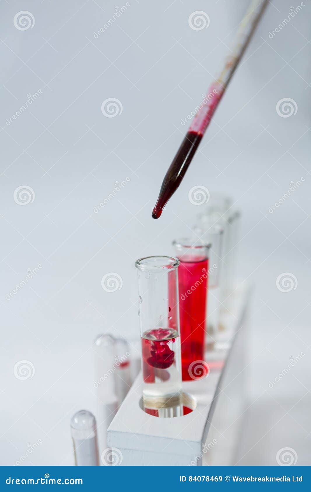 Blood Sample Being Drop into Test Tubes Stock Image - Image of ...