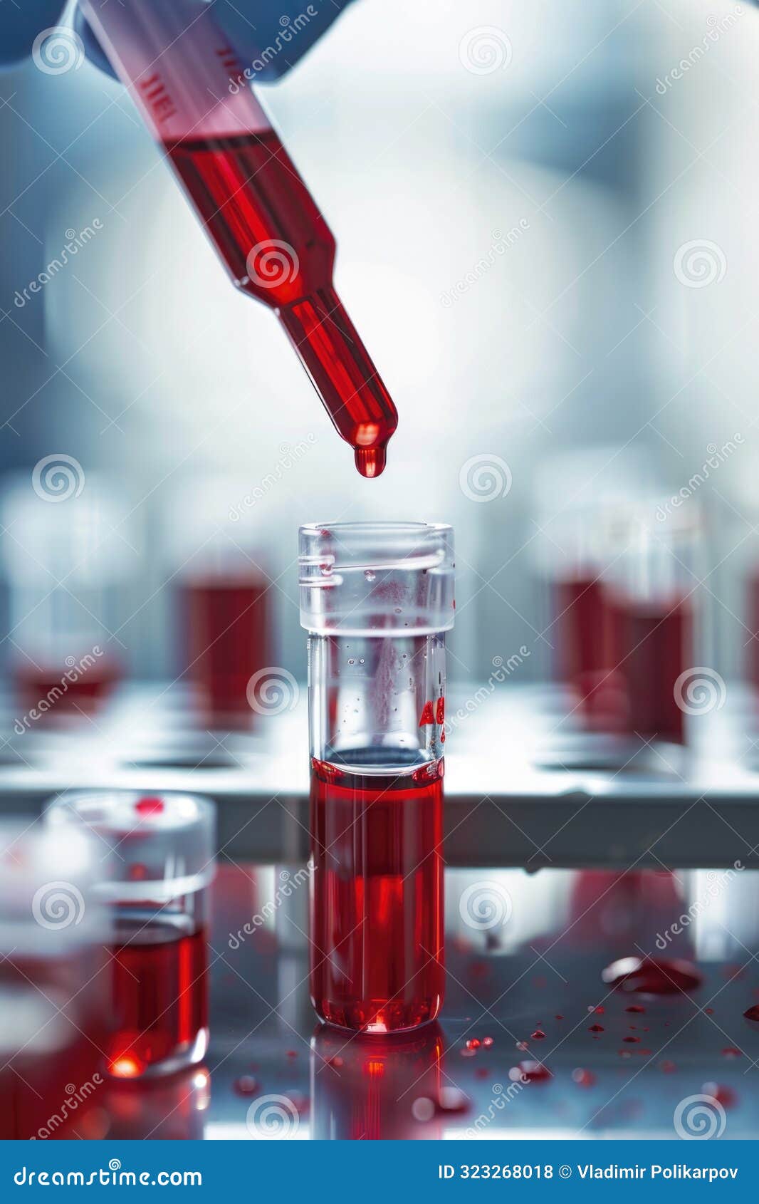 A Blood Sample is Being Filled with Red Liquid Stock Photo - Image of ...