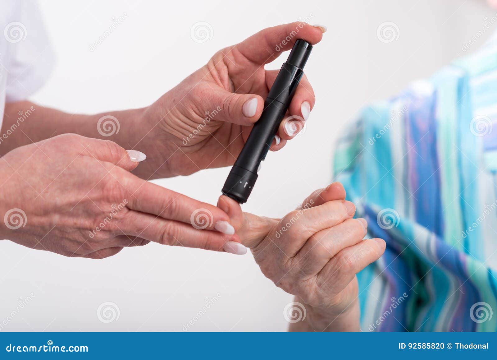Blood sugar level checking stock photo. Image of insulin - 92585820