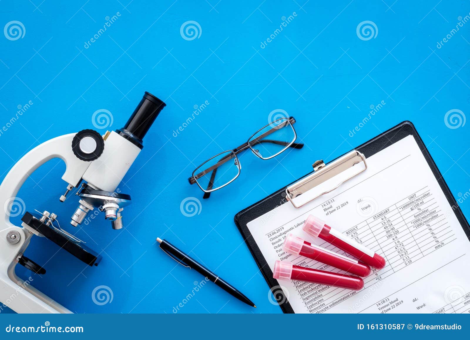 Blood Test Results Near Microscope on Blue Background Top View Copy ...