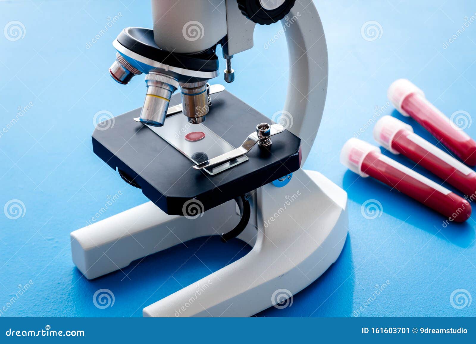 Blood Testing. Samples Viewing Undermicroscope on Blue Background Top ...