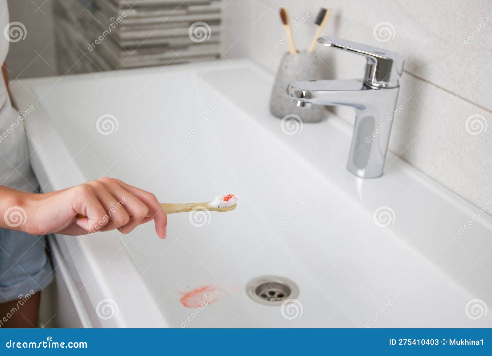 Toothbrush With Blood Closeup. A Woman Discovered Bleeding Gums While ...