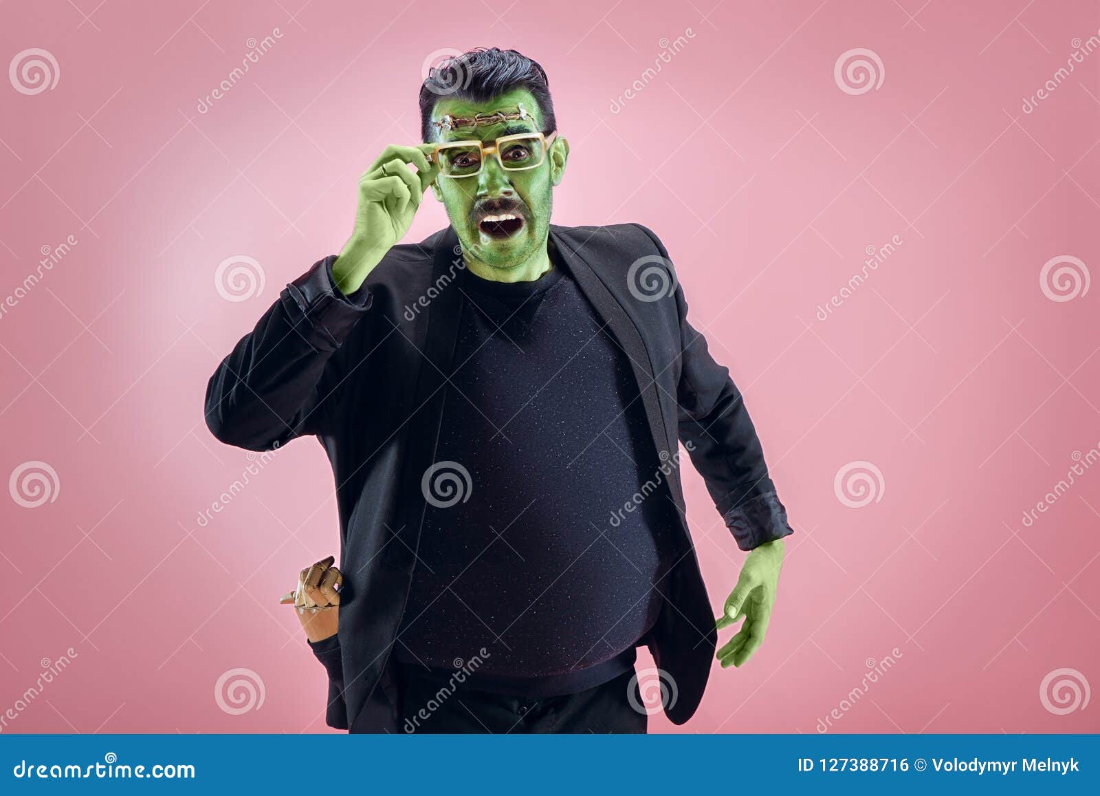 Bloody Halloween Theme: the Crazy Maniak Face on Studio Background ...