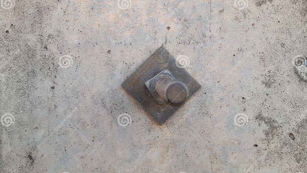 Blot and Nut on Concrete Wall. Stock Photo - Image of iron, macro ...