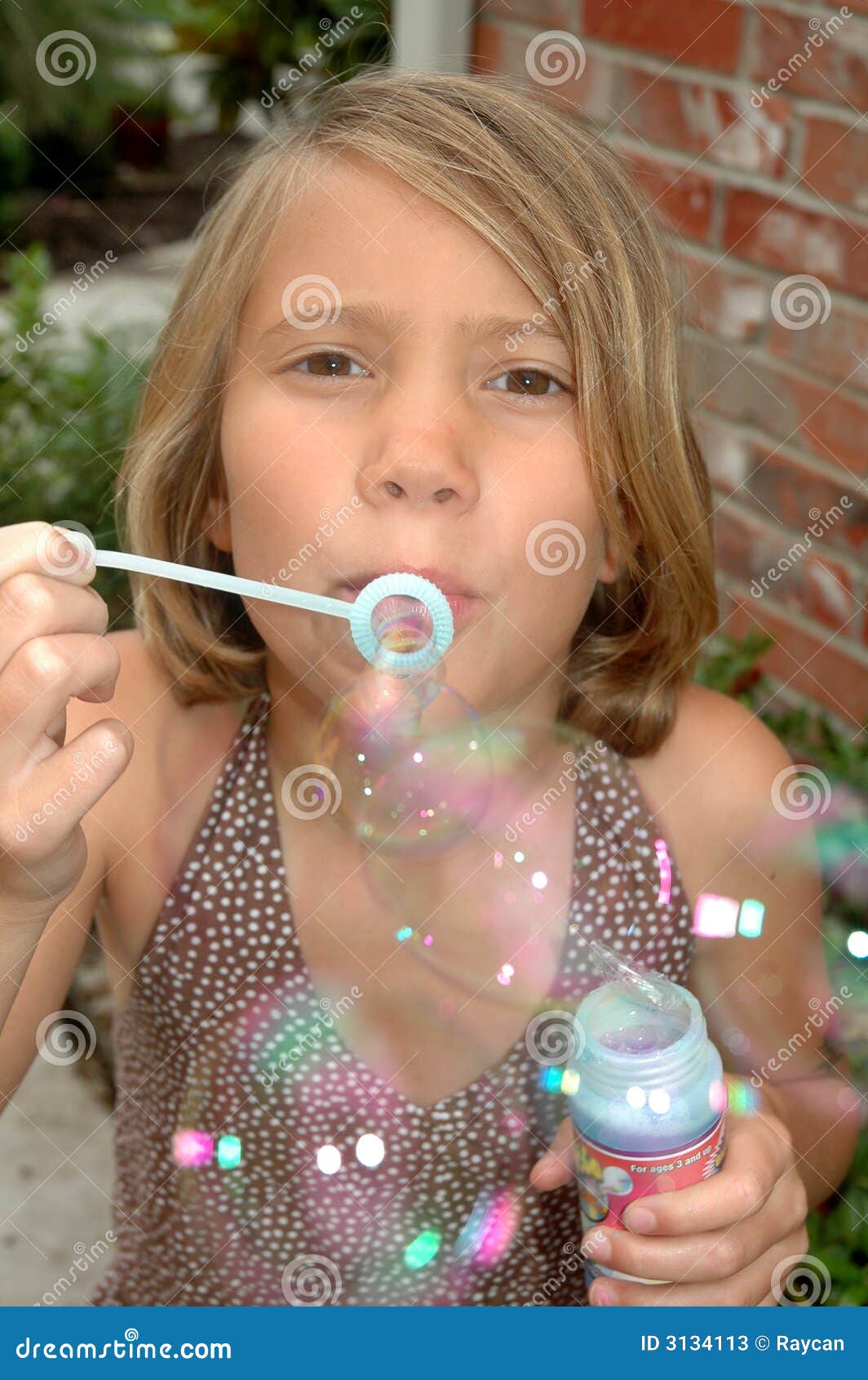 Blowing Bubbles at you stock image. Image of artifact - 3134113