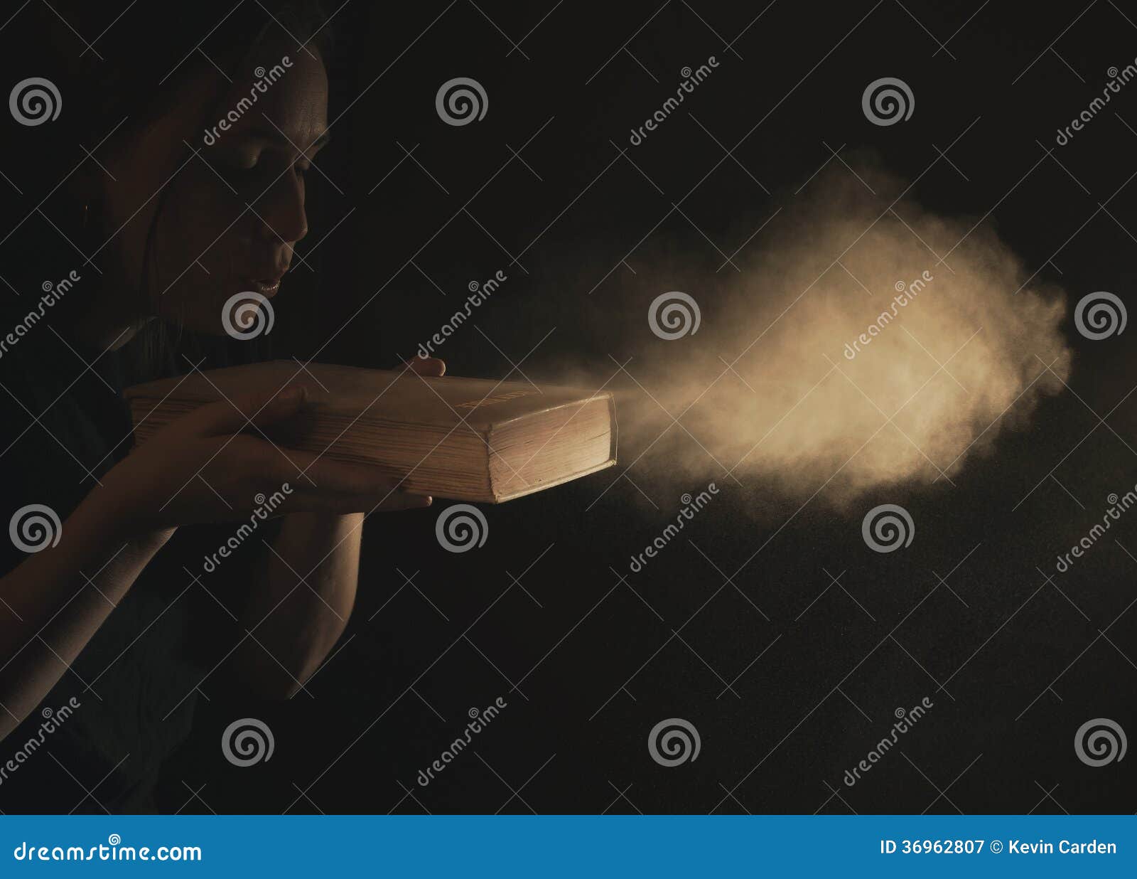 Blowing dust off Bible stock image. Image of woman, text - 36962807