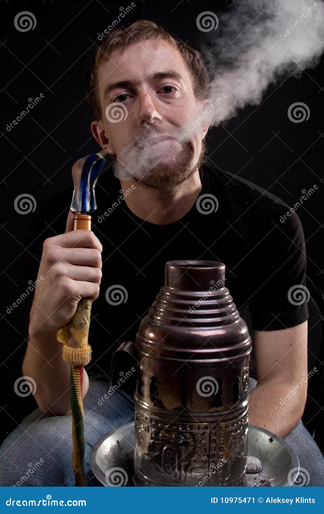 Blowing out smoke stock image. Image of dark, smoke, expression - 10975471