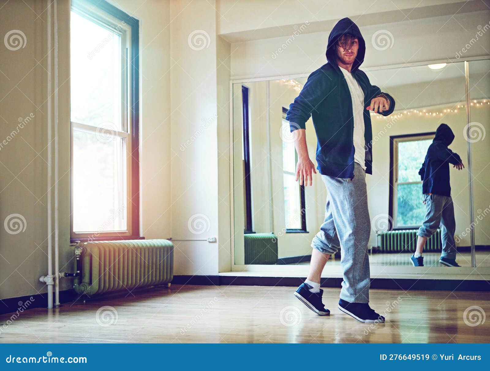 Blowing Up the Scene with His Breakdance Skills. a Young Man ...