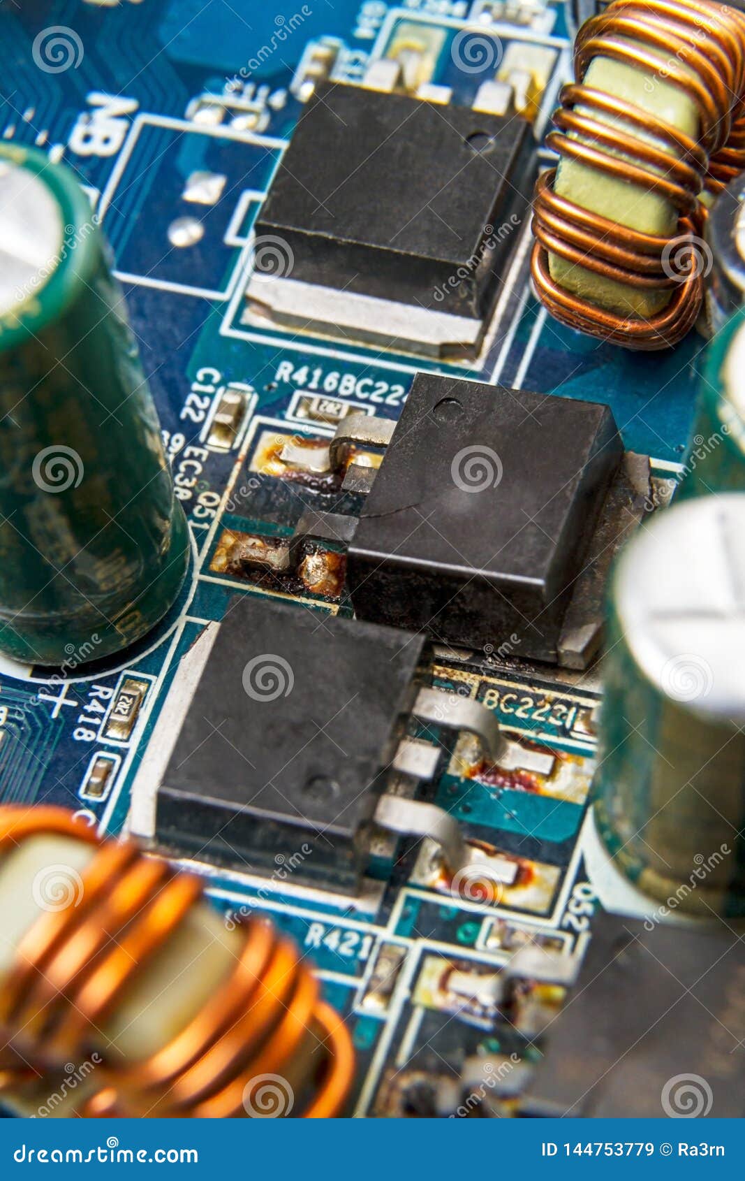 A MOSFET Transistor Key Is Soldered Out Of Computer Board Using A ...