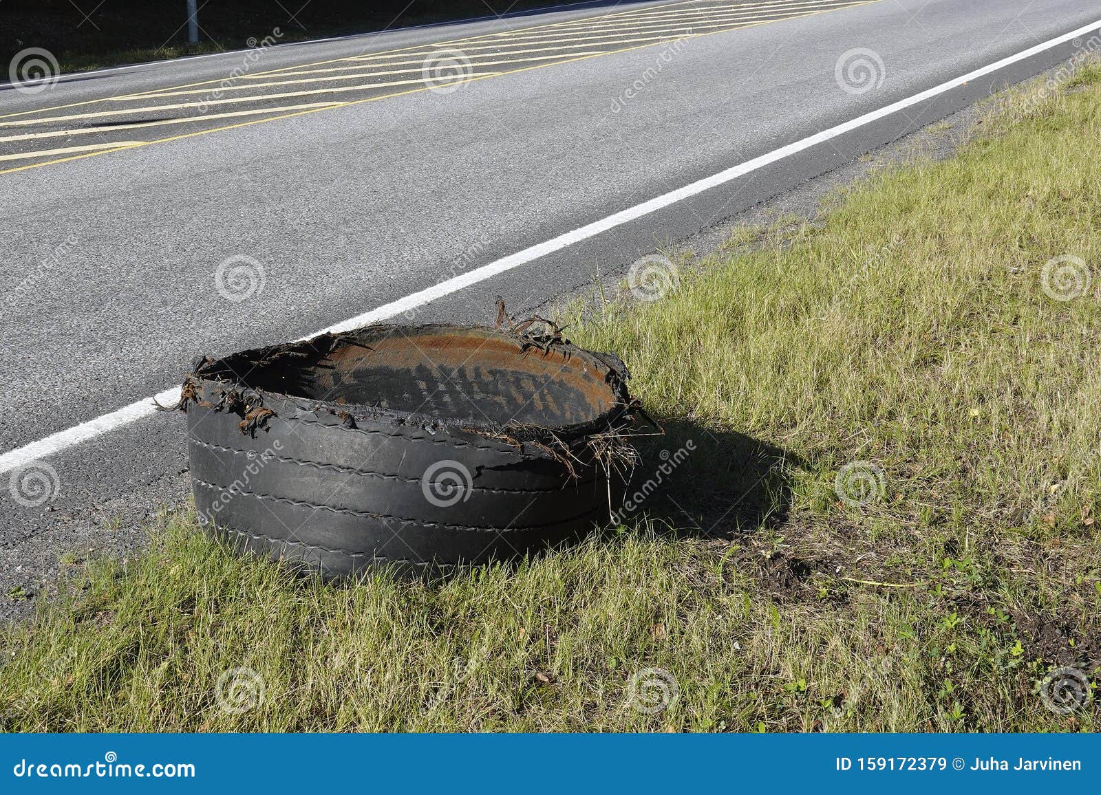Blown Out Tire With Exploded, Shredded And Damaged Rubber Royalty-Free ...