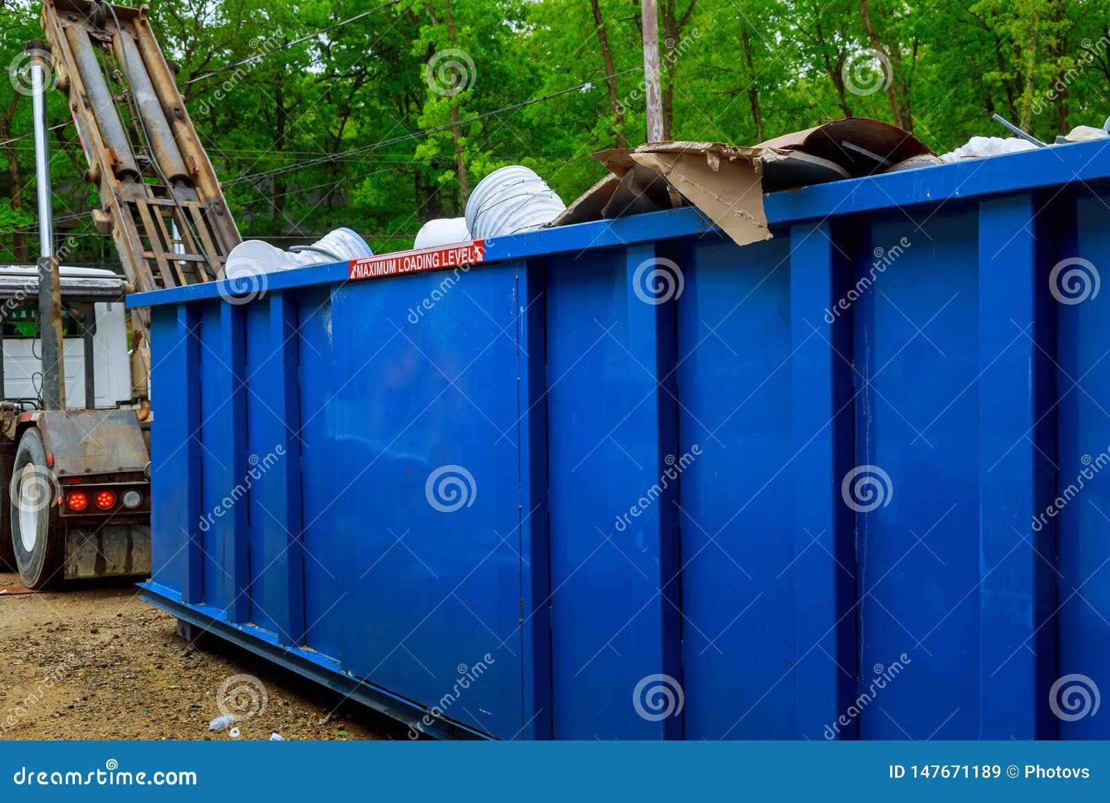 Container Trash Bin For Recycling With City Background. Green, Yellow ...