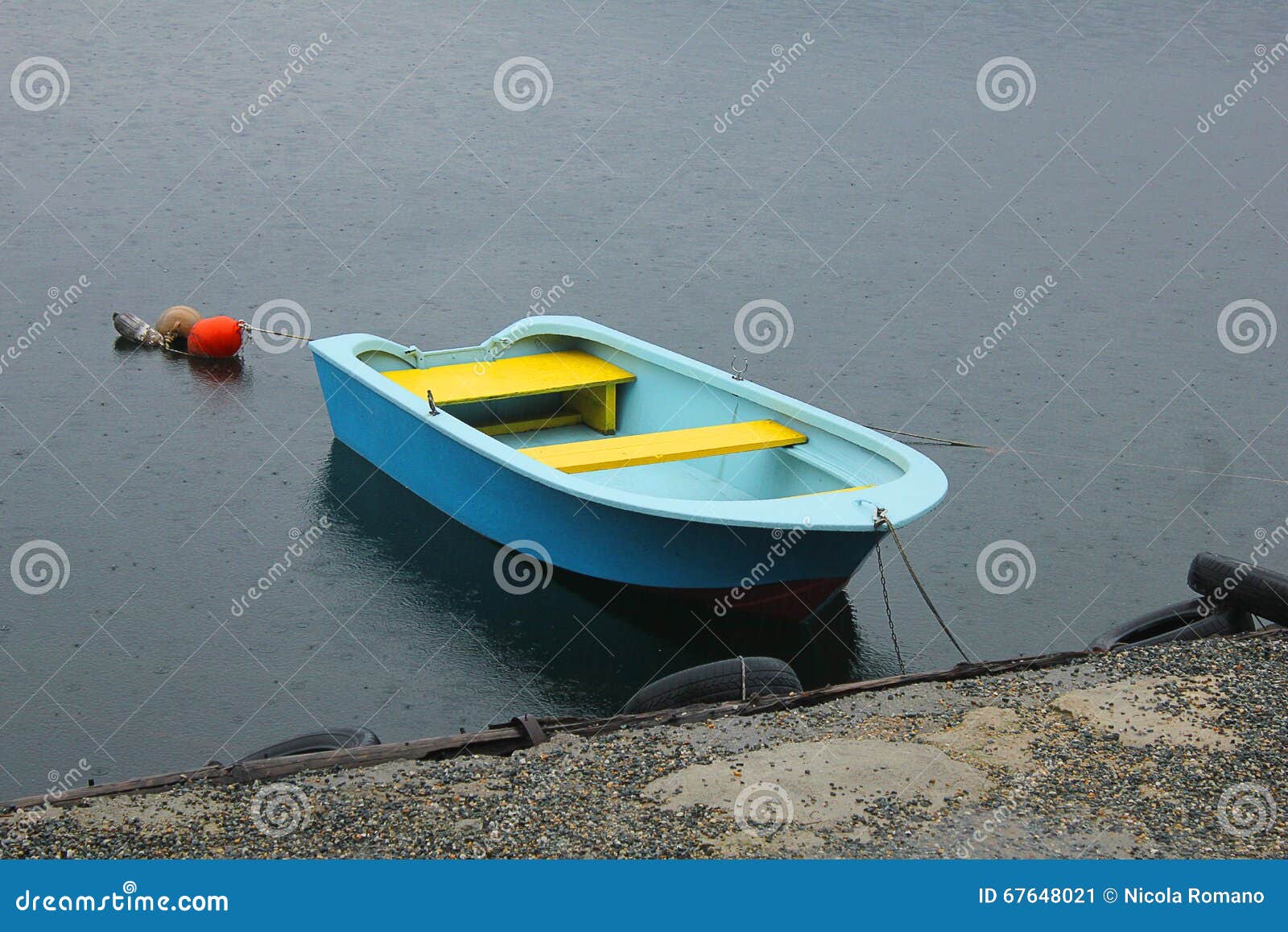 Blu and Yellow Boat on the Lake Stock Image - Image of boat, rain: 67648021