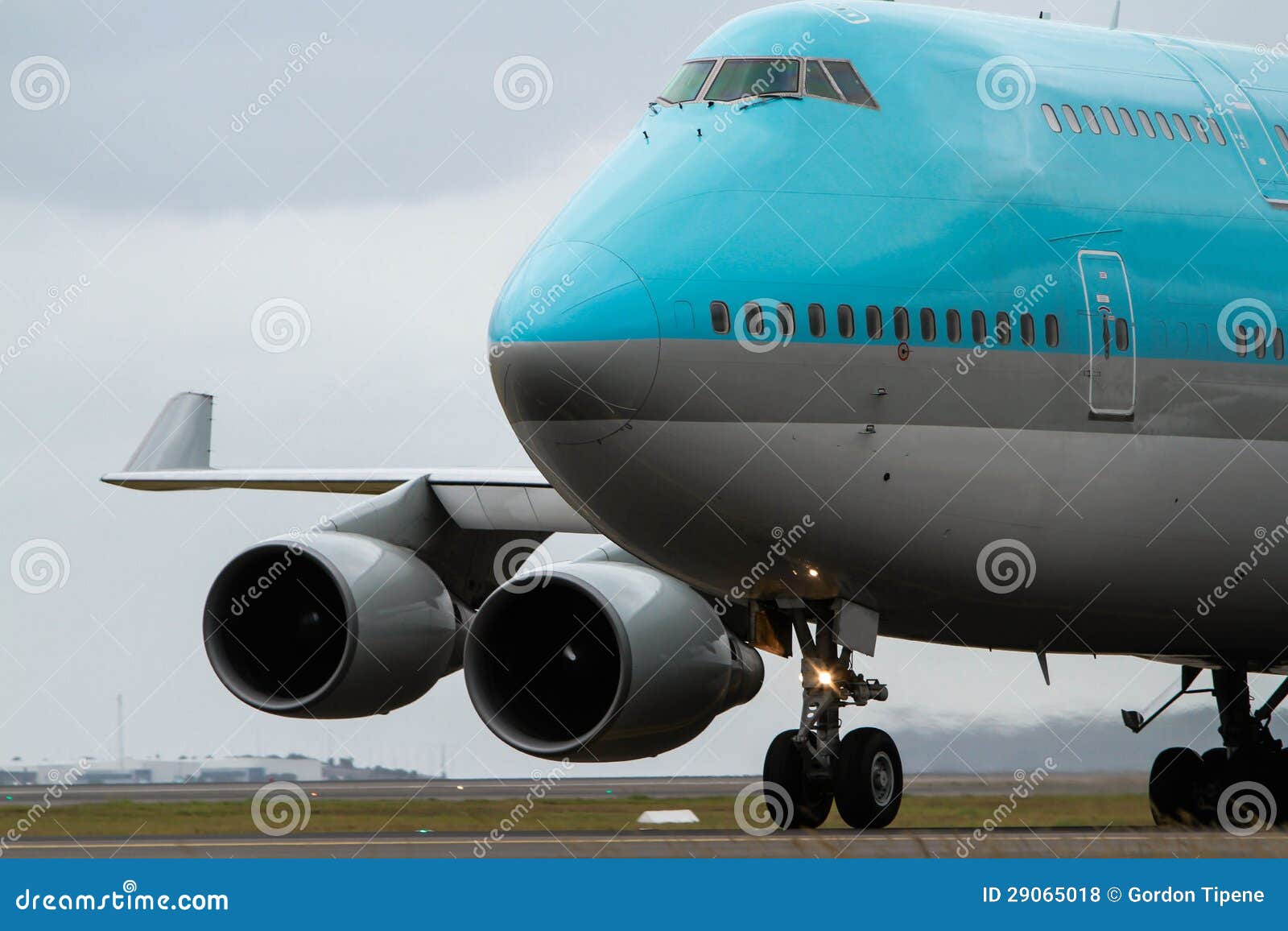 Blue 747 Jumbo Jet on Runway Stock Photo - Image of tarmac, industry ...