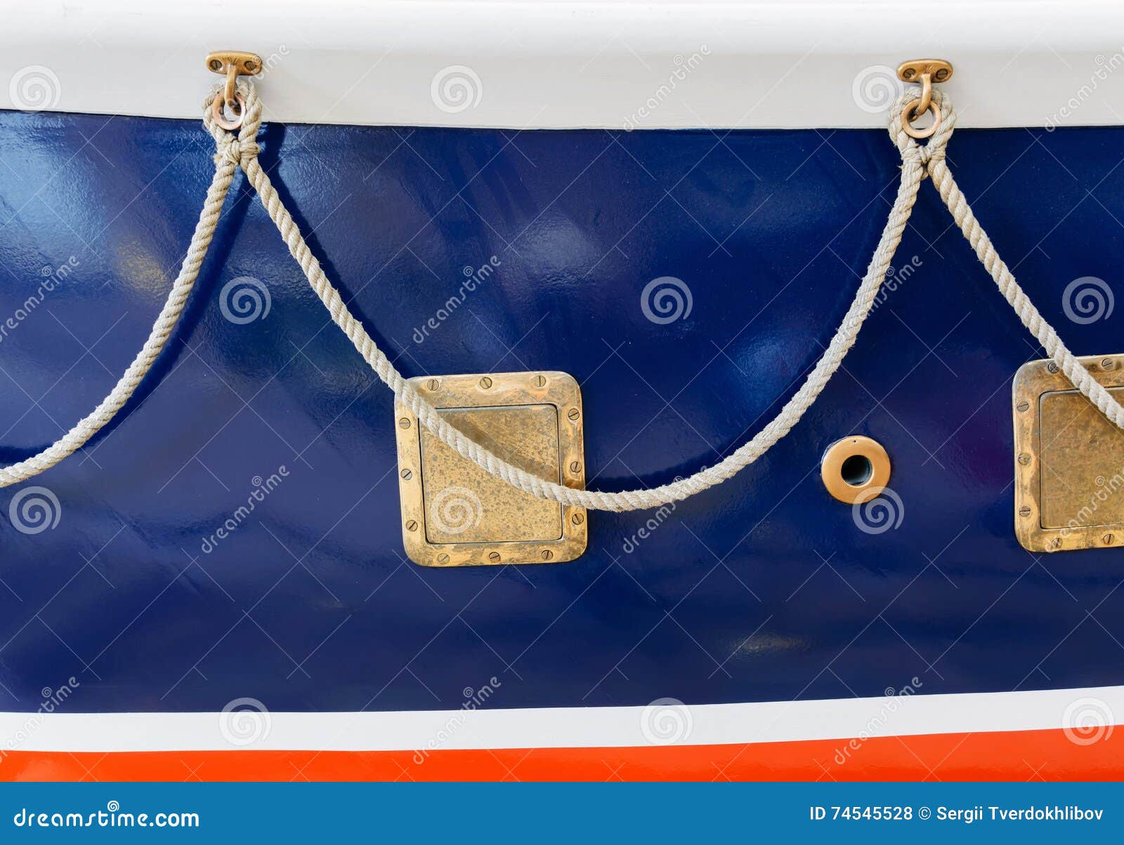 Blue Aboard an Old Ship and Hanging on the Rope it in Bronze Eyelets ...