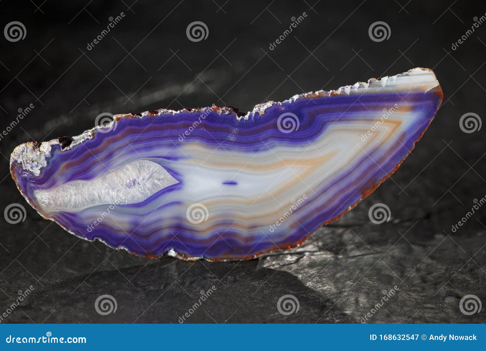 Blue Agate Slices in the Front and Back Light Standing Stock Image ...