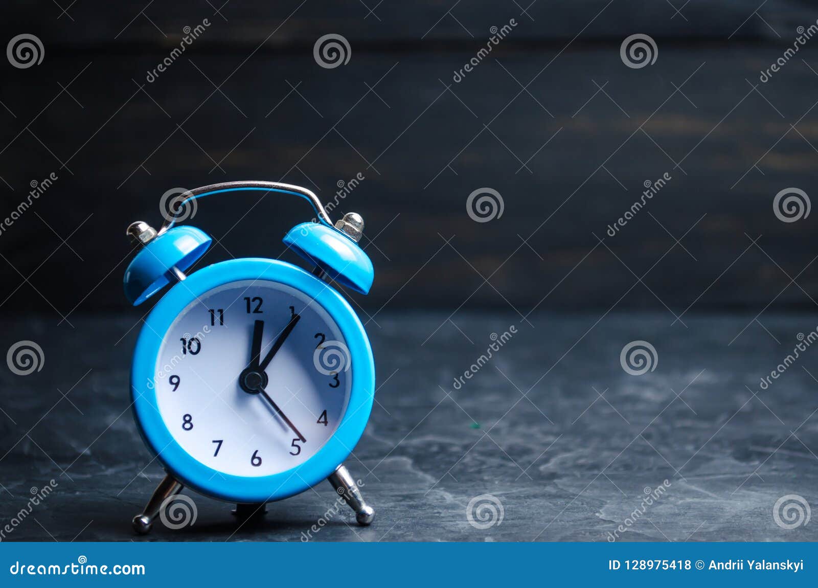 The Blue Alarm Clock Indicates the Beginning of the First on a Black ...