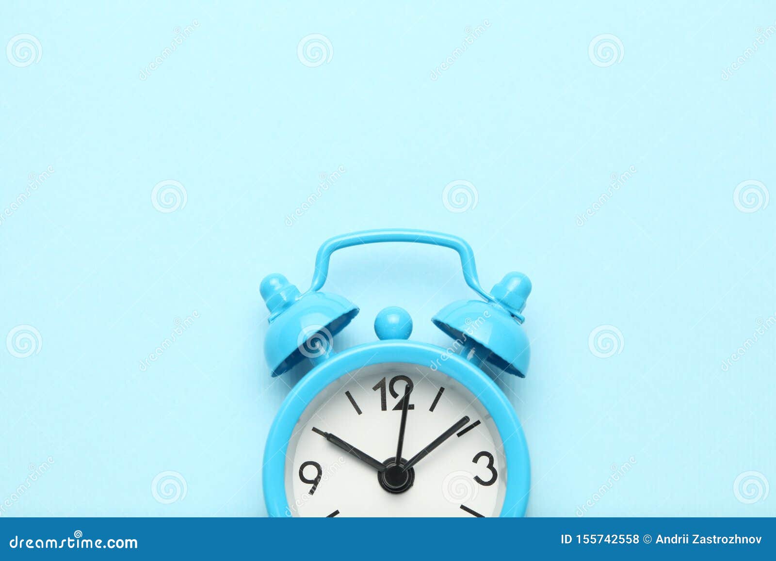 Blue Alarm Clock Isolated on Blue Background Stock Photo - Image of ...