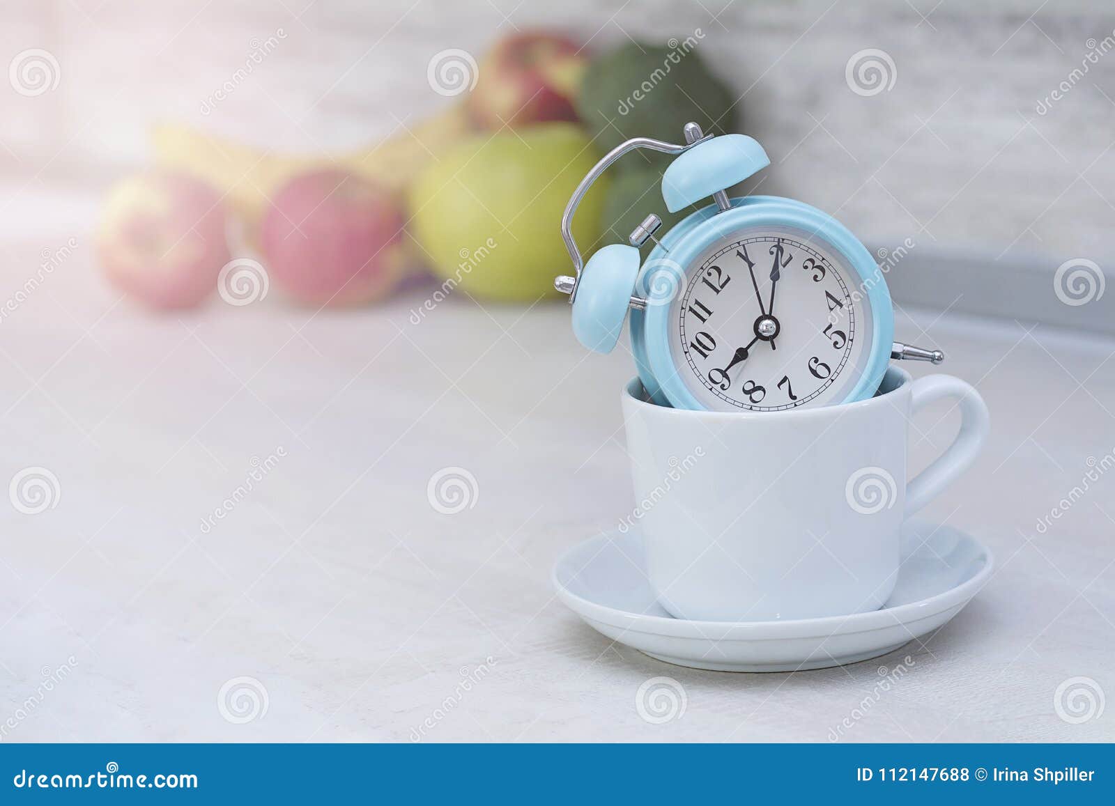 Blue Alarm Clock in Morning Light, Cup of Coffee and Letter on Table ...