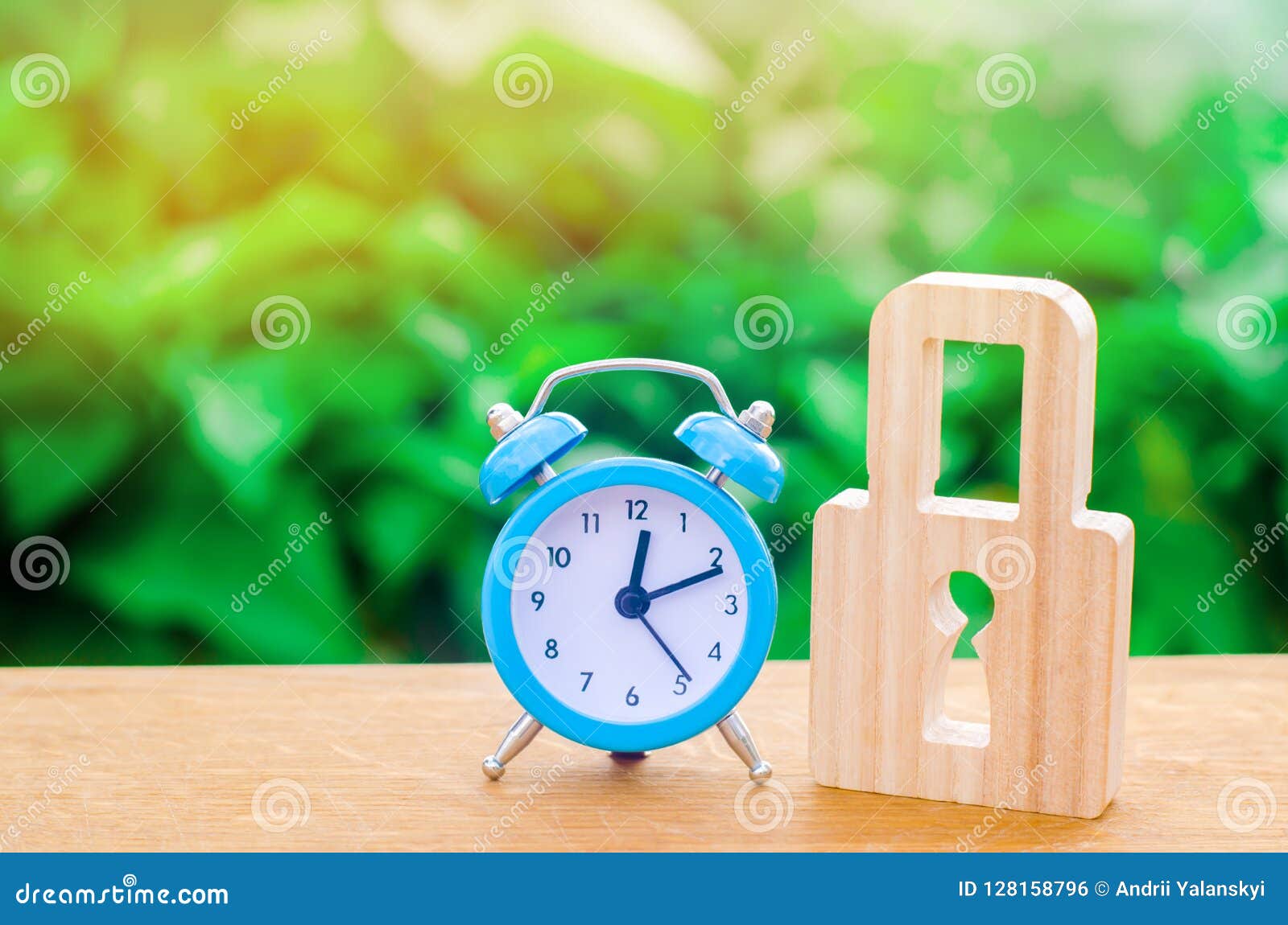 Blue Alarm Clock and Padlock. the Concept of an Alarm or a Temporary ...