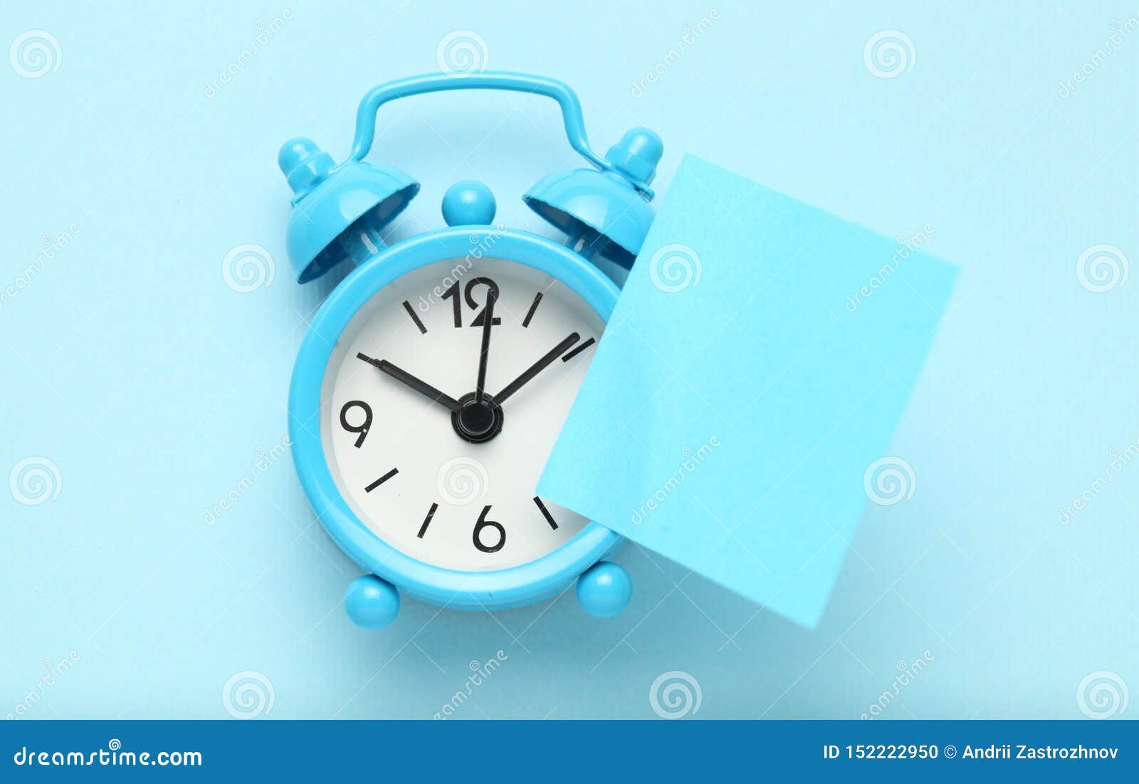 Blue Alarm Clock and a Reminder Note. Time Management Concept Stock ...