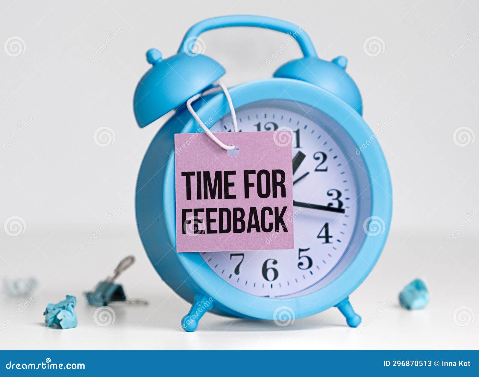 Blue Alarm Clock with Text on Card Time for Feedback on White ...