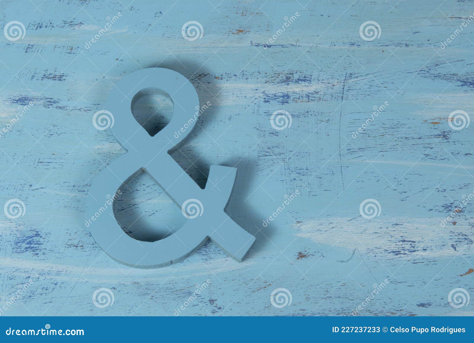 Blue Ampersand Symbol on a Background of the Same Color Stock ...