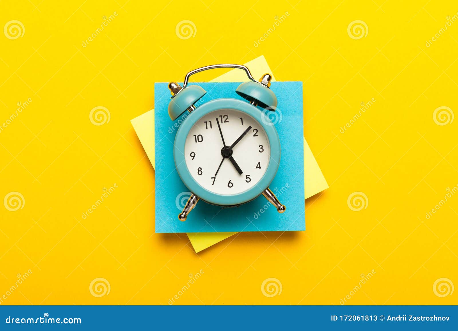 Blue Analog Clock on a Stack of Note Paper. Business Time Distribution ...