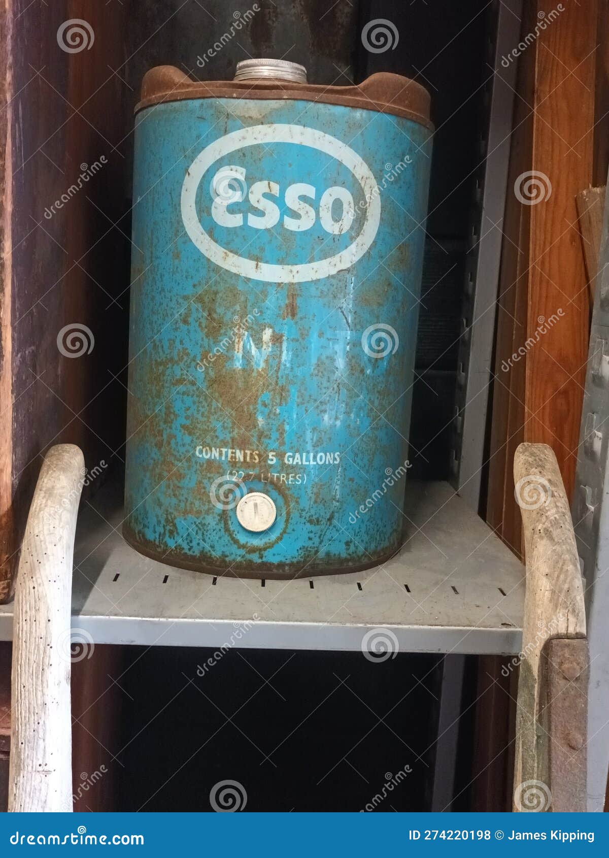 Blue Antique Esso oil drum editorial stock photo. Image of esso - 274220198