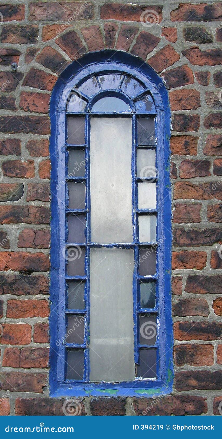 Blue Arched Window stock image. Image of arch, brickwork - 394219