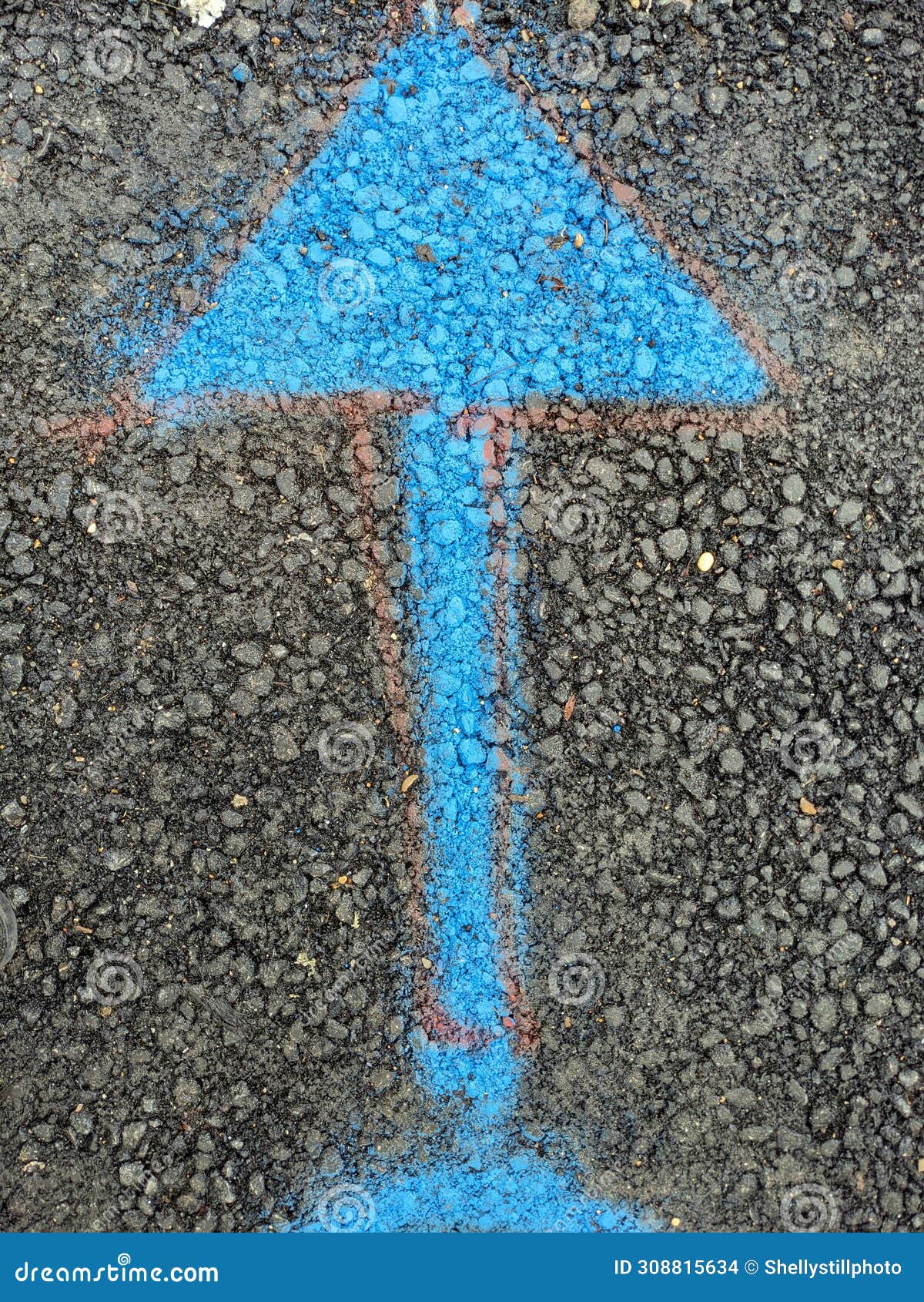 Blue Arrow Painted on Pavement Pointing Stock Photo - Image of road ...