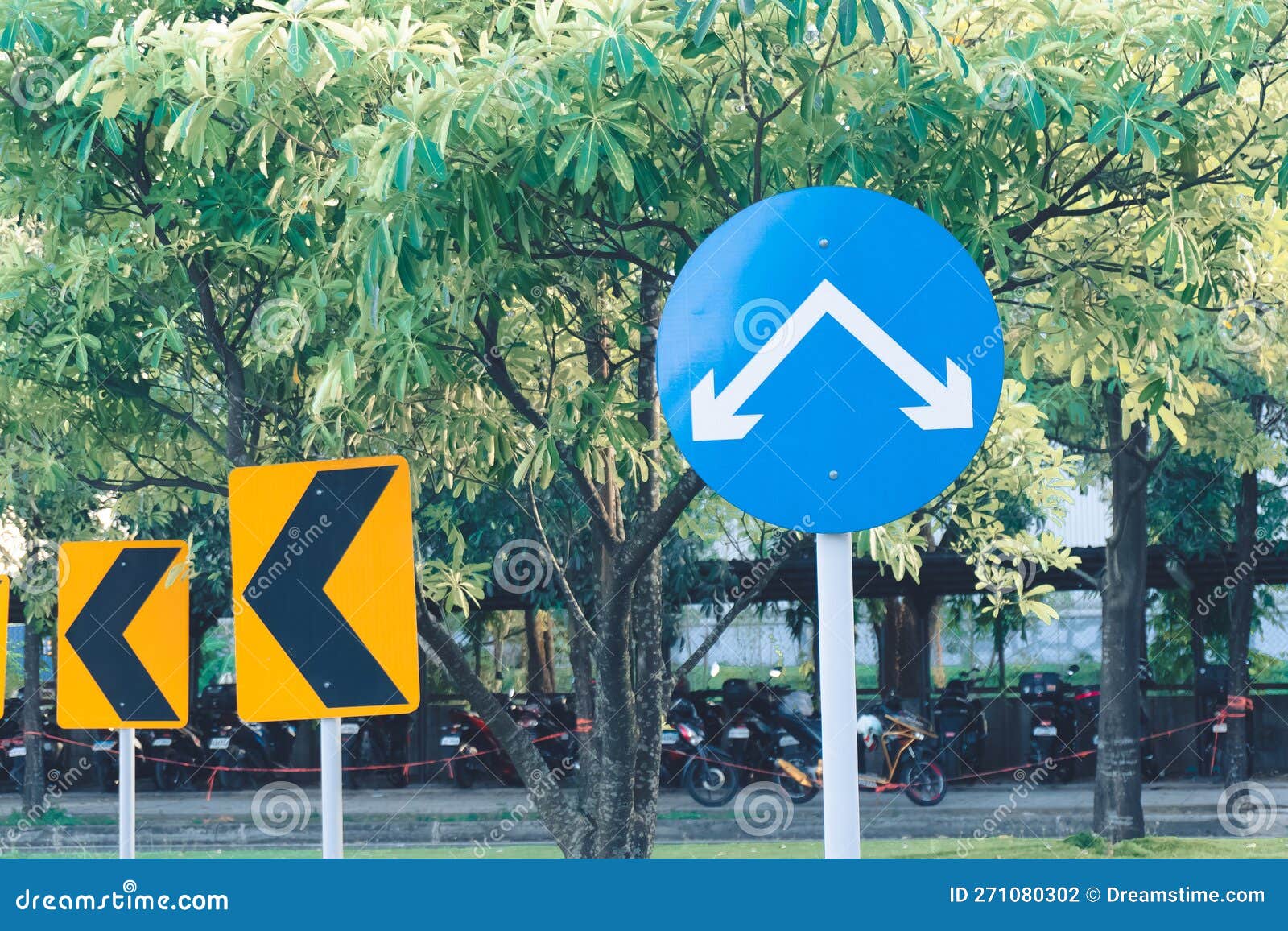 Blue Arrow Sign Indicating a Two Way Road Stock Photo - Image of travel ...