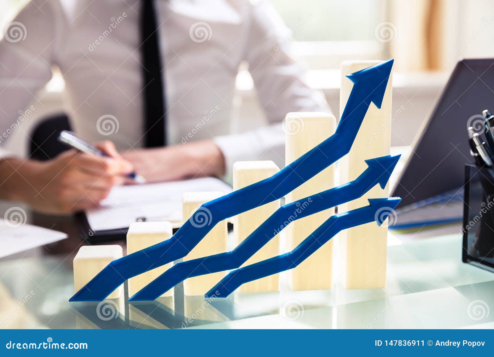 Blue Arrows in Front of Graph Showing Upward Direction Stock Image ...