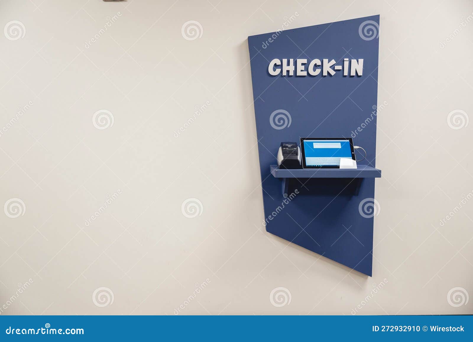 Blue Automated Check-in Machine Mounted on a Wall. Stock Photo - Image ...