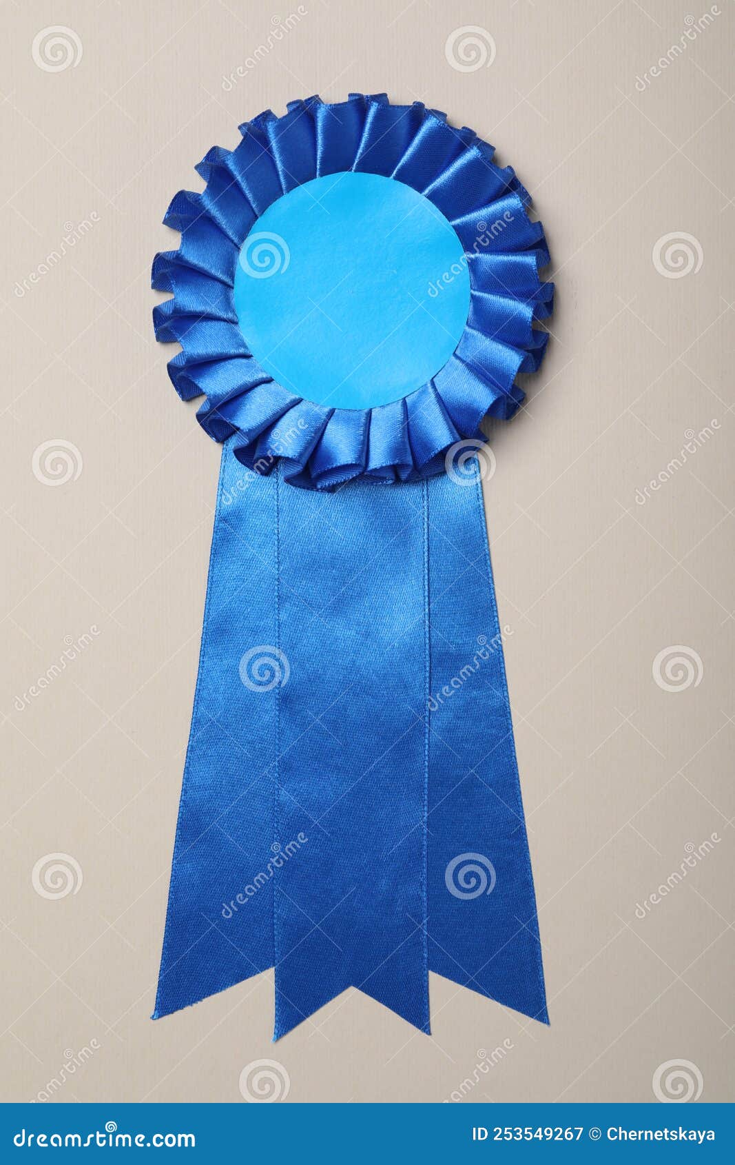Blue Award Ribbon on Beige Background, Top View Stock Image - Image of ...