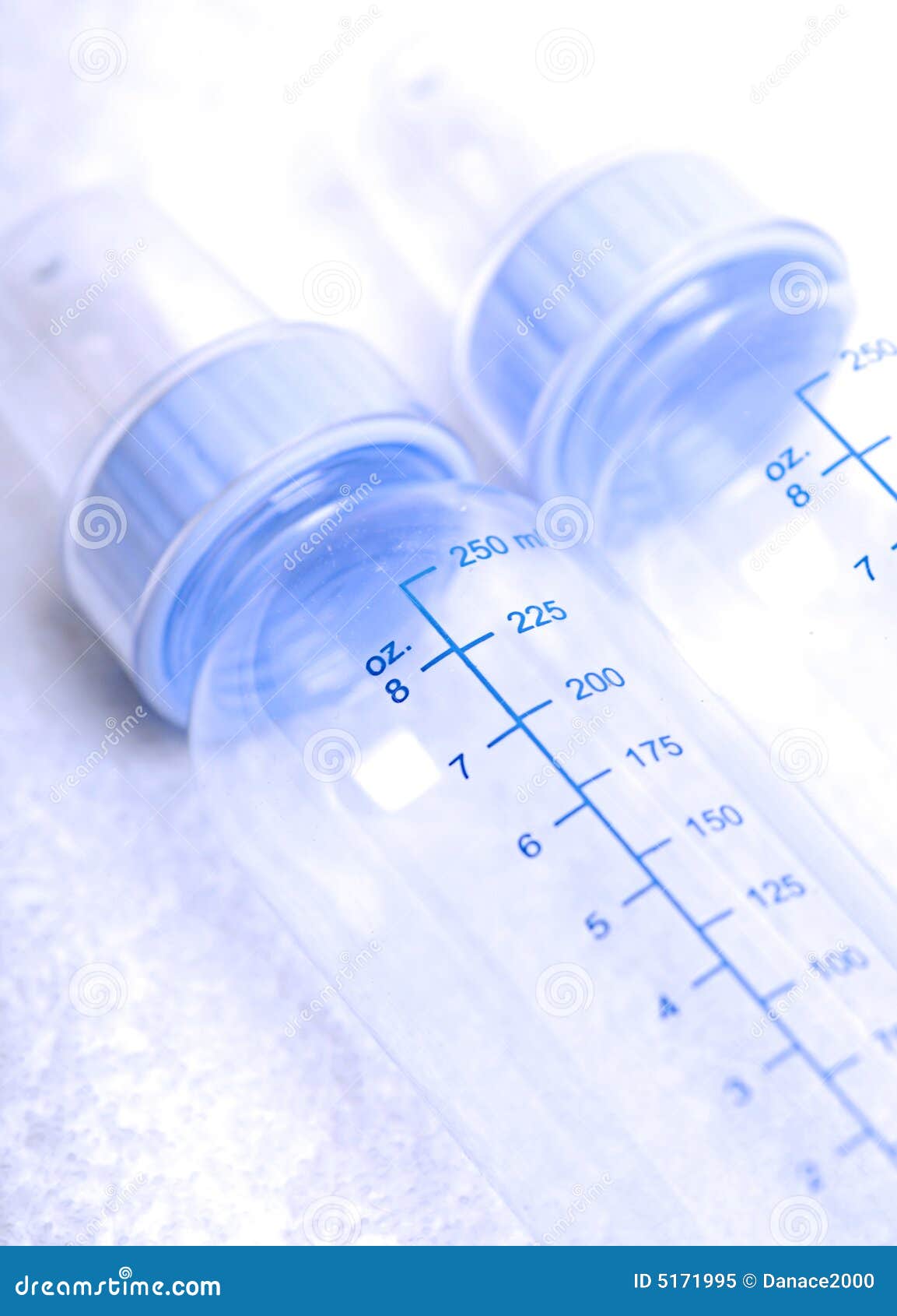 Blue baby bottles stock image. Image of measure, feed - 5171995