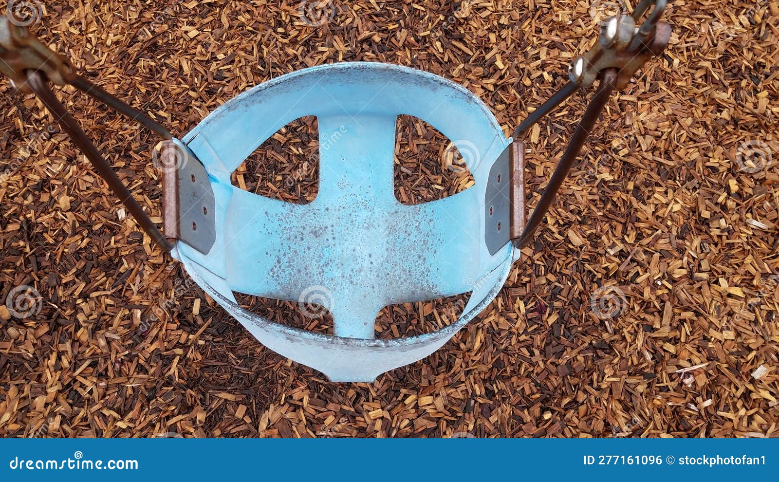 Blue Baby Swing with Mildew and Wood Chips Stock Photo - Image of ...