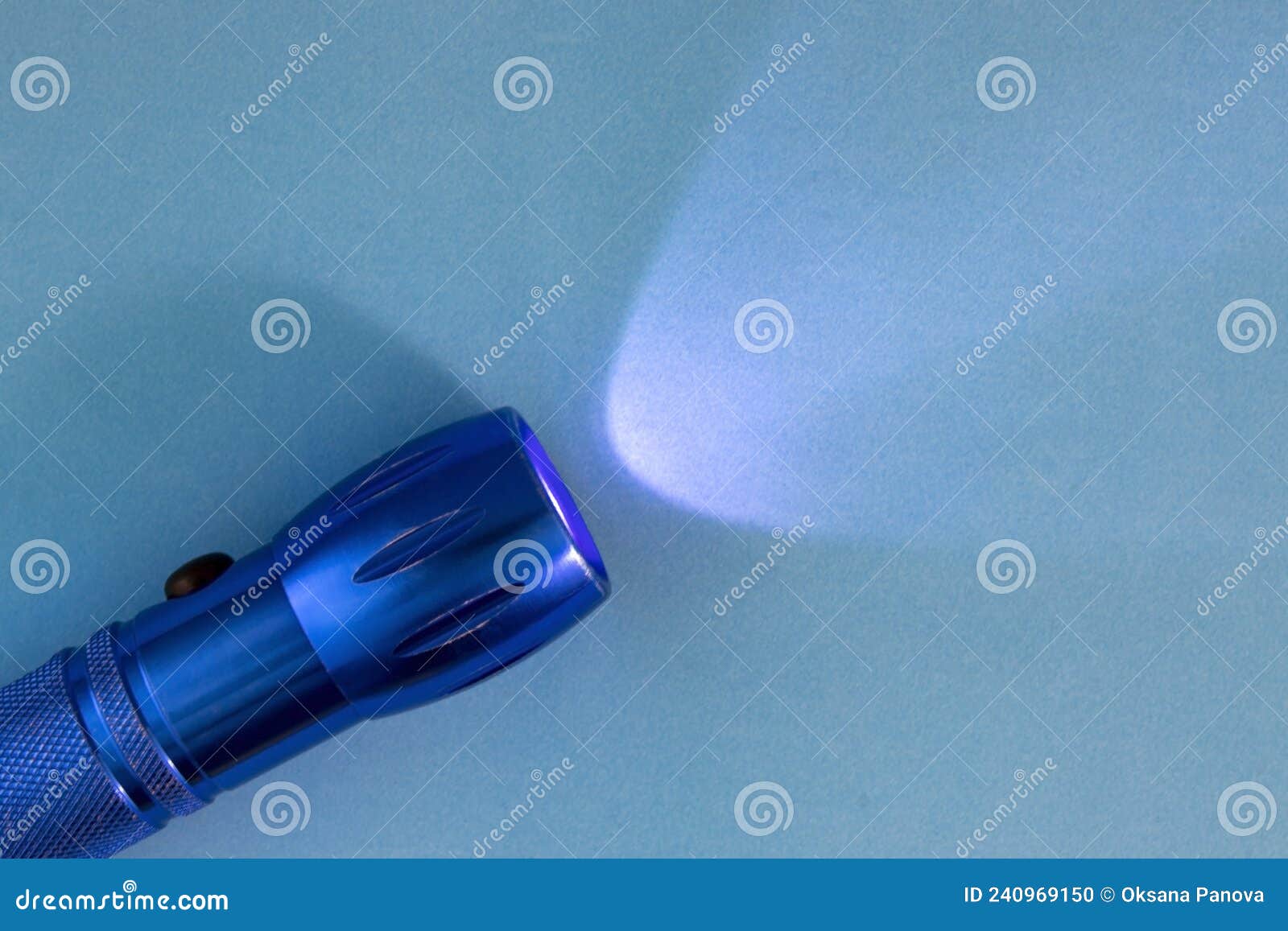 Blue Background with Flashlight on. Turned on Flashlight on a Blue ...