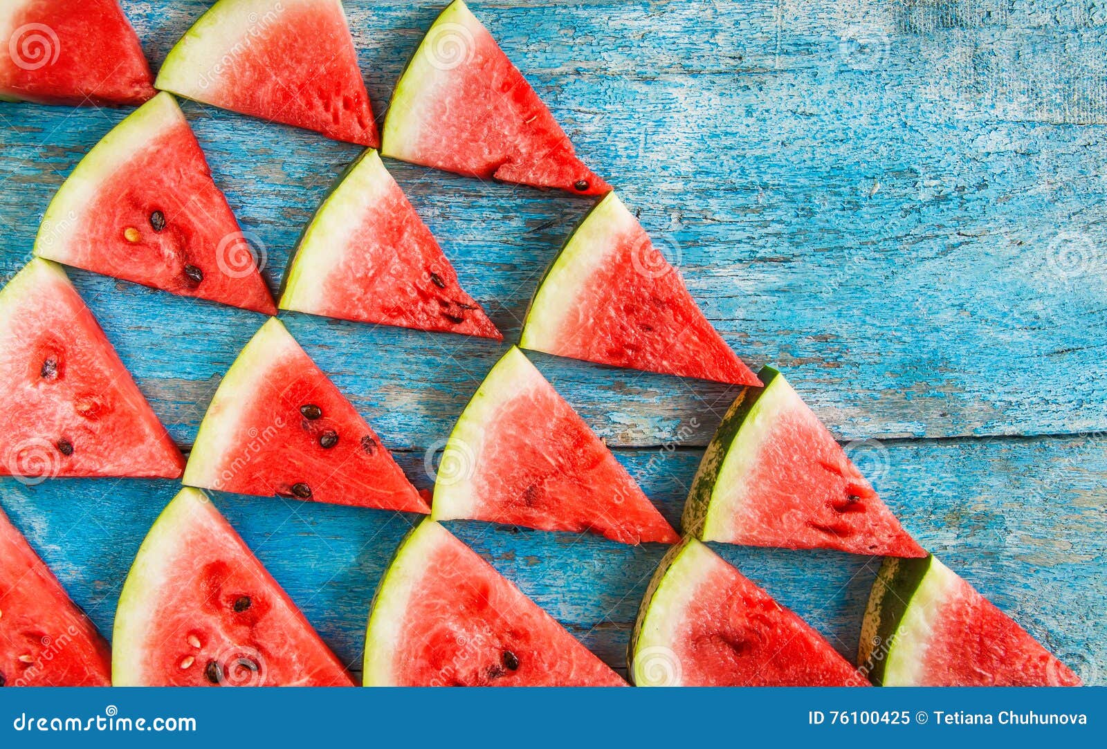 On a Blue Background Flat Triangles of Watermelon Stock Image - Image ...