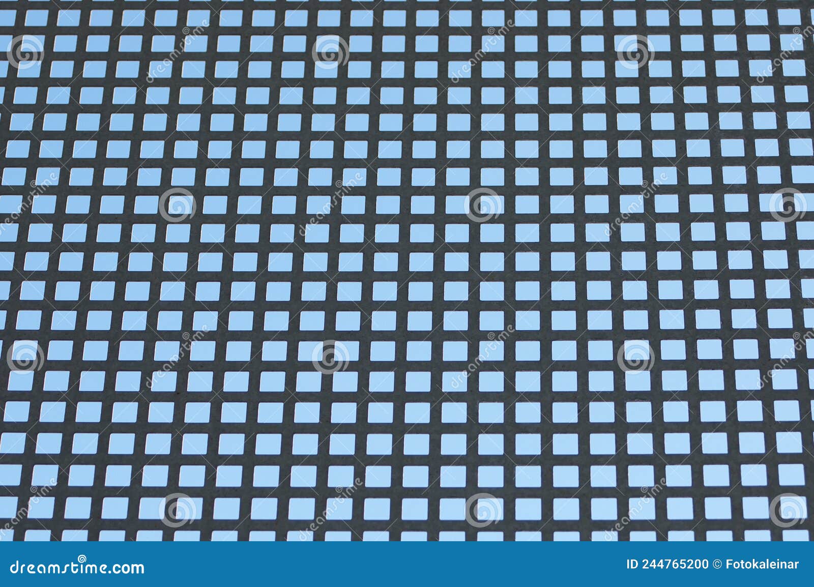 Blue Background, in the Photo a Metal Grid with Square Cells on a Blue ...