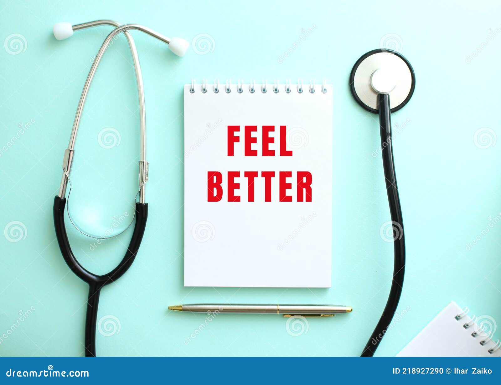 On a Blue Background, a Stethoscope and a White Notepad with the Red ...