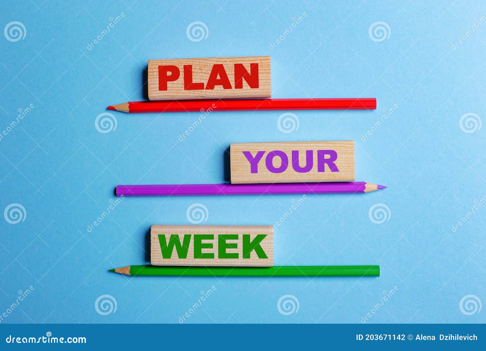 On a Blue Background, Three Colored Pencils, Three Wooden Blocks with ...